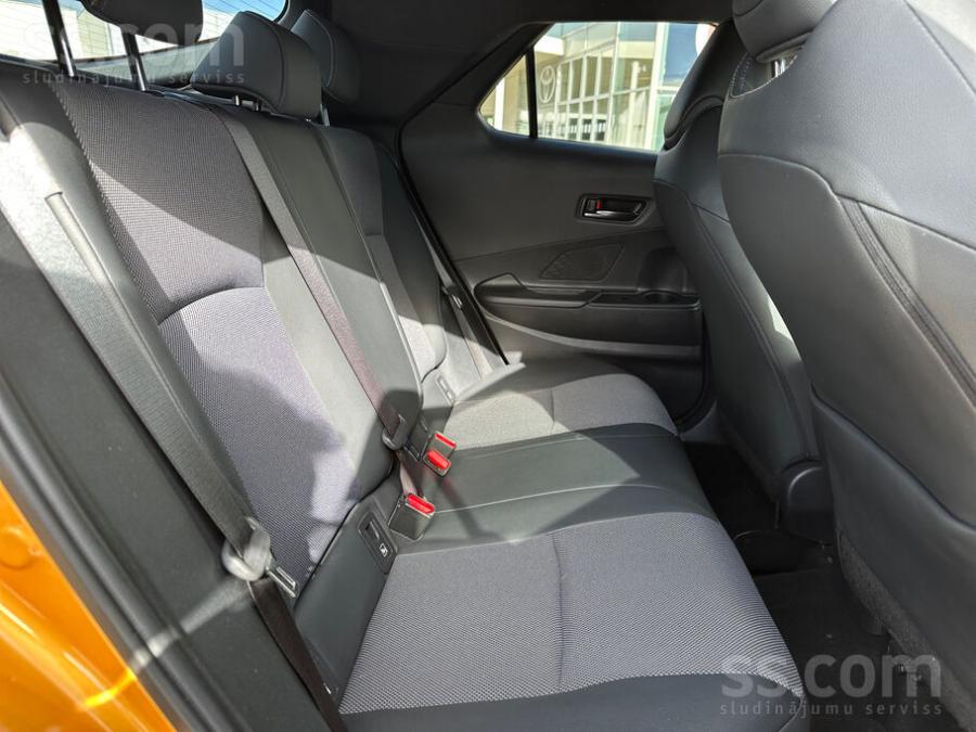 Orange Toyota C-HR 2025 in Liepaja, with an engine capacity of 1.80 L and mileage of 21 thousand km for 36600 €, photo 21 on AUTOMOTO.COM.LV