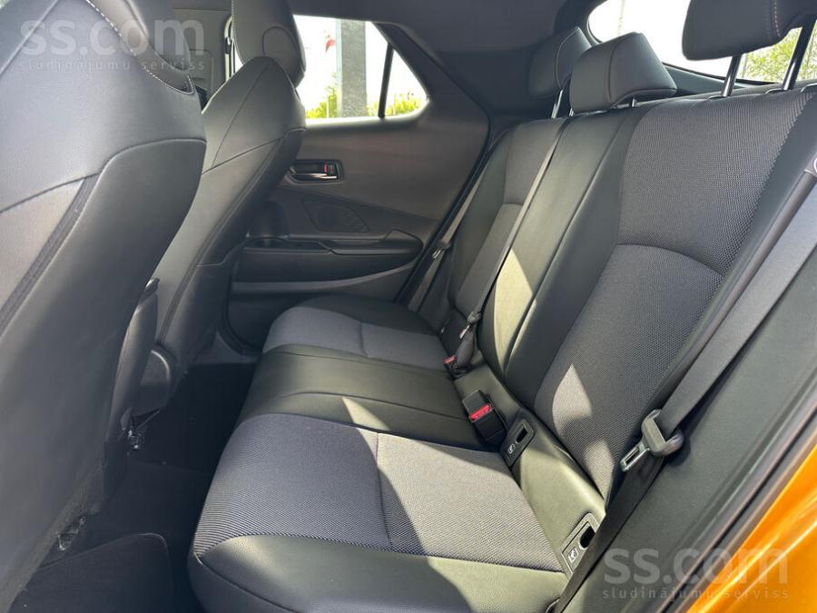 Orange Toyota C-HR 2025 in Liepaja, with an engine capacity of 1.80 L and mileage of 21 thousand km for 36600 €, photo 23 on AUTOMOTO.COM.LV