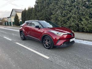 Red Toyota C-HR 2018 in Kaunas, with an engine capacity of 1.80 L and mileage of 163 thousand km for 16750 €, photo 2 on AUTOMOTO.COM.LV