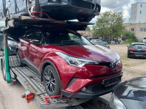 Sarkans Toyota C-HR 2018 Utena, ar dzinēja tilpumu 1.80 L un nobraukumu 197 tūkst. km par 14150 €, foto  vietnē AUTOMOTO.COM.LV