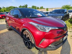 Sarkans Toyota C-HR 2019 Panevēža, ar dzinēja tilpumu 1.80 L un nobraukumu 180 tūkst. km par 15900 €, foto 3 vietnē AUTOMOTO.COM.LV