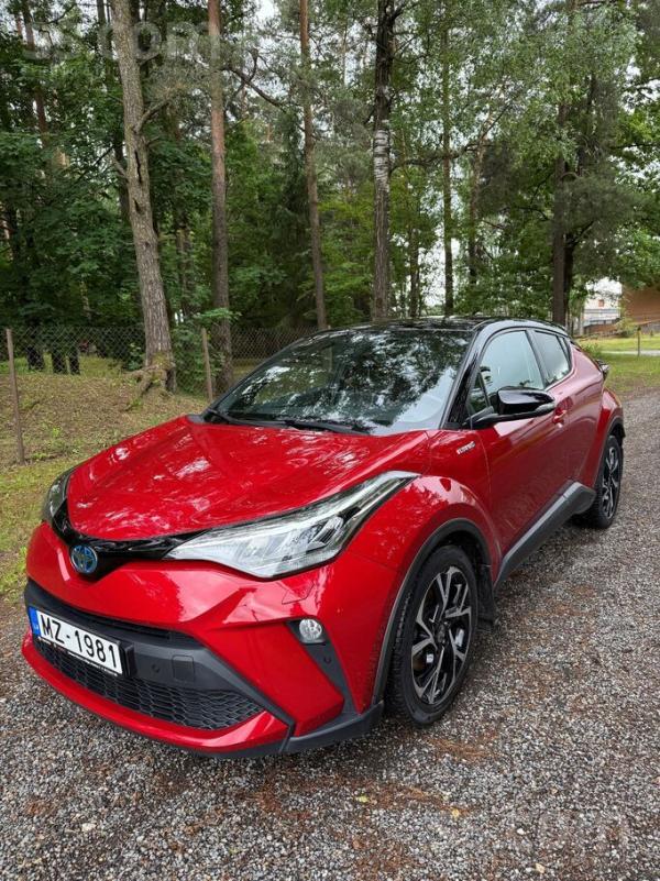 Red Toyota C-HR 2021 in Riga, with an engine capacity of 1.80 L and mileage of 80 thousand km for 23500 €, photo 1 on AUTOMOTO.COM.LV