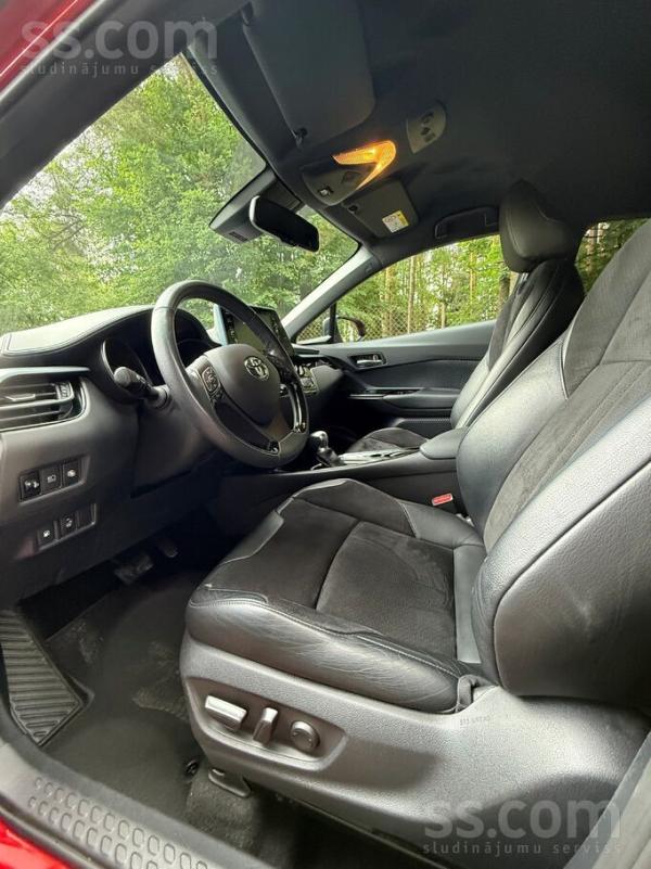 Red Toyota C-HR 2021 in Riga, with an engine capacity of 1.80 L and mileage of 80 thousand km for 23500 €, photo 2 on AUTOMOTO.COM.LV