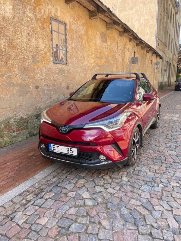 Red Toyota C-HR 2019 in Riga, with an engine capacity of 1.80 L and mileage of 181 thousand km for 15000 €, photo 1 on AUTOMOTO.COM.LV