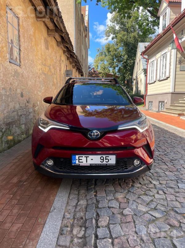 Red Toyota C-HR 2019 in Riga, with an engine capacity of 1.80 L and mileage of 181 thousand km for 15000 €, photo 3 on AUTOMOTO.COM.LV