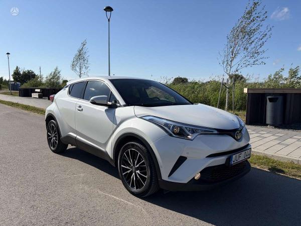White Toyota C-HR 2017 in Klaipeda, with an engine capacity of 1.20 L and mileage of 93 thousand km for 16900 €, photo 2 on AUTOMOTO.COM.LV