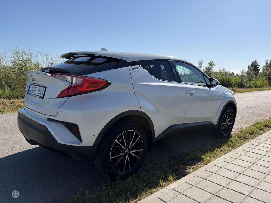 Белый Тойота C-HR 2017 в Клайпеда, объемом двигателя 1.20 л и пробегом 93 тыс. км за 16900 €, фото 7 на AUTOMOTO.COM.LV