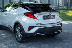 White Toyota C-HR 2021 in Vilnius, with an engine capacity of 1.99 L and mileage of 47 thousand km for 23500 €, photo 14 on AUTOMOTO.COM.LV