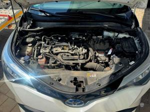 White Toyota C-HR 2021 in Taurage, with an engine capacity of 1.99 L and mileage of 288 thousand km for 12500 €, photo 18 on AUTOMOTO.COM.LV