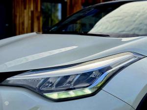 White Toyota C-HR 2021 in Taurage, with an engine capacity of 1.99 L and mileage of 279 thousand km for 12500 €, photo 12 on AUTOMOTO.COM.LV