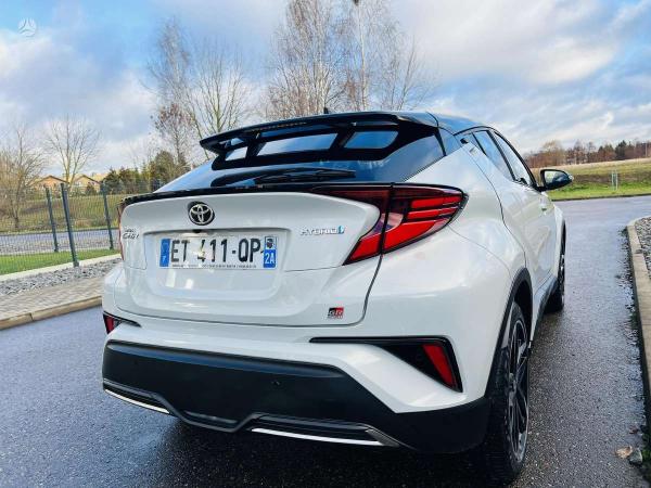 White Toyota C-HR 2022 in Kaunas, with an engine capacity of 1.99 L and mileage of 51 thousand km for 23190 €, photo 9 on AUTOMOTO.COM.LV