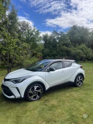 Белый Тойота C-HR 2023 в Паневежис, объемом двигателя 2.00 л и пробегом 73 тыс. км за 22700 €, фото 6 на AUTOMOTO.COM.LV