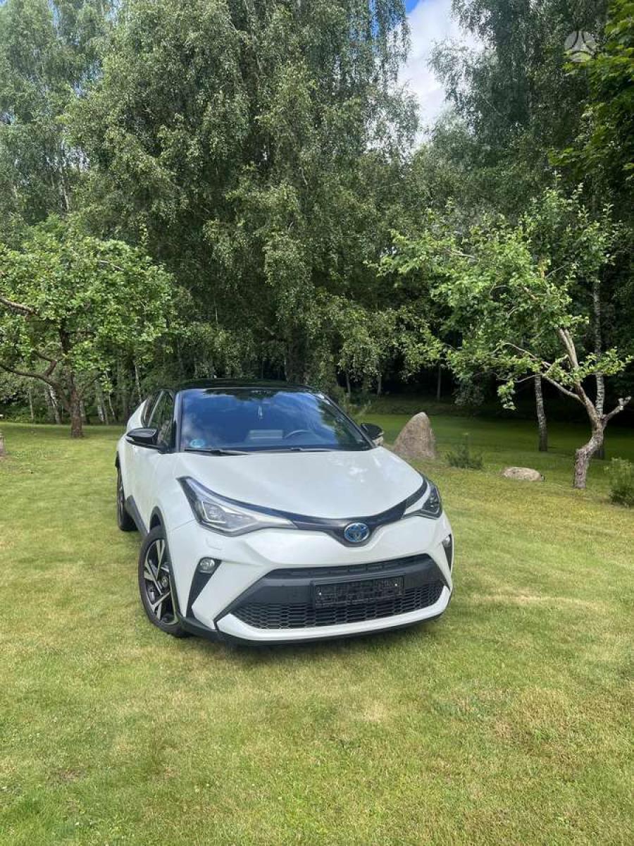 Белый Тойота C-HR 2023 в Паневежис, объемом двигателя 2.00 л и пробегом 73 тыс. км за 22700 €, фото 7 на AUTOMOTO.COM.LV
