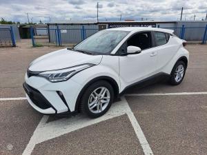 White Toyota C-HR 2023 in Panevezys, with an engine capacity of 1.80 L and mileage of 20 thousand km for 21000 €, photo  on AUTOMOTO.COM.LV