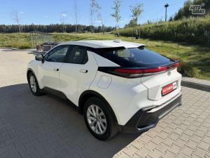 Белый Тойота C-HR 2024 в Вильнюс, объемом двигателя 1.80 л и пробегом 78 тыс. км за 24950 €, фото 11 на AUTOMOTO.COM.LV
