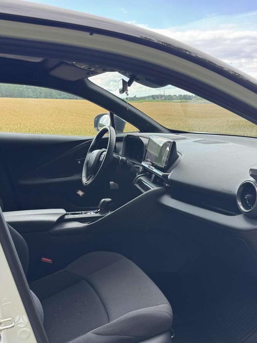 Белый Тойота C-HR 2024 в Вильнюс, объемом двигателя 1.80 л и пробегом 24 тыс. км за 25900 €, фото 15 на AUTOMOTO.COM.LV