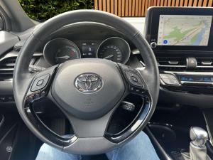 White Toyota C-HR 2023 in Kaunas, with an engine capacity of 1.80 L and mileage of 20 thousand km for 23990 €, photo 15 on AUTOMOTO.COM.LV