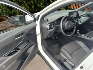 White Toyota C-HR 2023 in Kaunas, with an engine capacity of 1.80 L and mileage of 20 thousand km for 23990 €, photo 25 on AUTOMOTO.COM.LV
