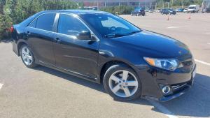 Black Toyota Camry 2013 in Siauliai, with an engine capacity of 2.49 L and mileage of 207 thousand km for 7850 €, photo 4 on AUTOMOTO.COM.LV