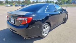 Black Toyota Camry 2013 in Siauliai, with an engine capacity of 2.49 L and mileage of 207 thousand km for 7850 €, photo 5 on AUTOMOTO.COM.LV