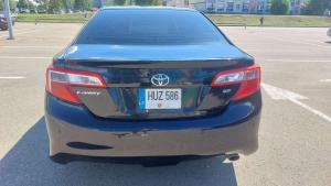 Black Toyota Camry 2013 in Siauliai, with an engine capacity of 2.49 L and mileage of 207 thousand km for 7850 €, photo 7 on AUTOMOTO.COM.LV