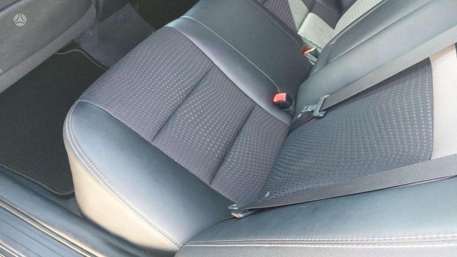 Black Toyota Camry 2013 in Siauliai, with an engine capacity of 2.49 L and mileage of 207 thousand km for 7850 €, photo 13 on AUTOMOTO.COM.LV