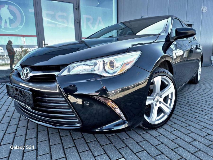 Black Toyota Camry 2016 in Siauliai, with an engine capacity of 2.50 L and mileage of 190 thousand km for 10900 €, photo 5 on AUTOMOTO.COM.LV