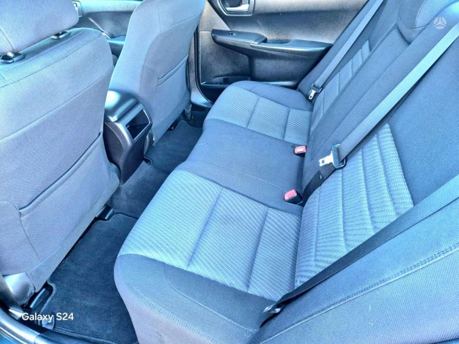 Black Toyota Camry 2016 in Siauliai, with an engine capacity of 2.50 L and mileage of 190 thousand km for 10900 €, photo 18 on AUTOMOTO.COM.LV