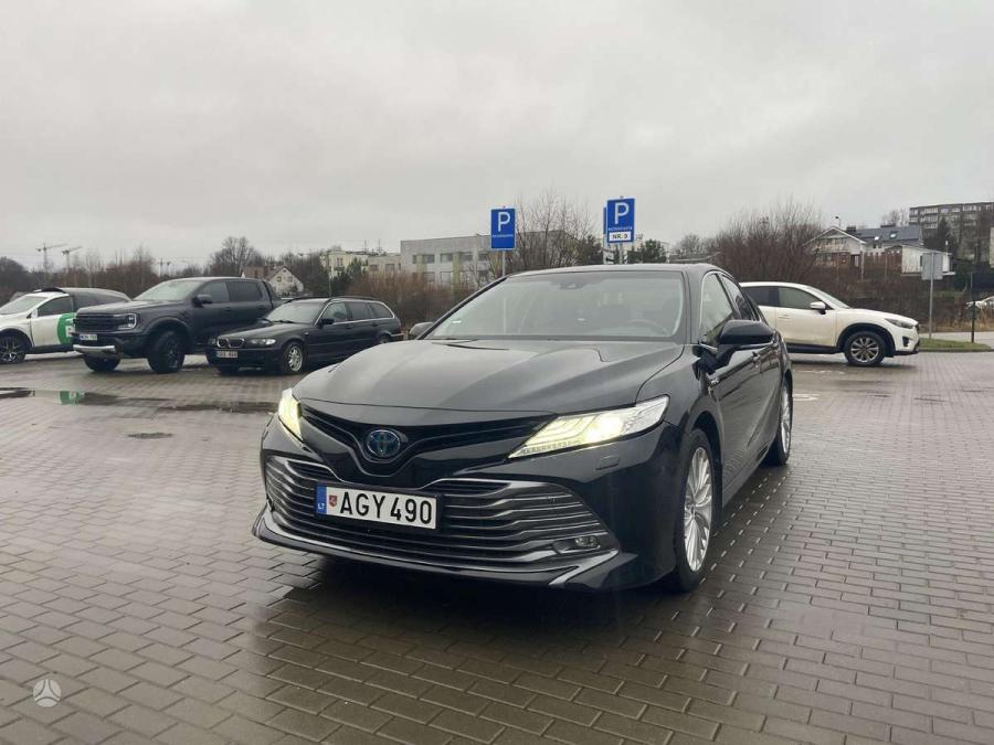 Melns Toyota Camry 2019 Viļņa, ar dzinēja tilpumu 2.50 L un nobraukumu 174 tūkst. km par 18000 €, foto 2 vietnē AUTOMOTO.COM.LV