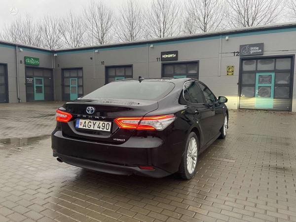 Black Toyota Camry 2019 in Vilnius, with an engine capacity of 2.50 L and mileage of 174 thousand km for 18000 €, photo 7 on AUTOMOTO.COM.LV