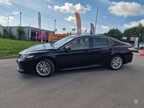 Black Toyota Camry 2019 in Kaunas, with an engine capacity of 2.49 L and mileage of 199 thousand km for 16490 €, photo 4 on AUTOMOTO.COM.LV