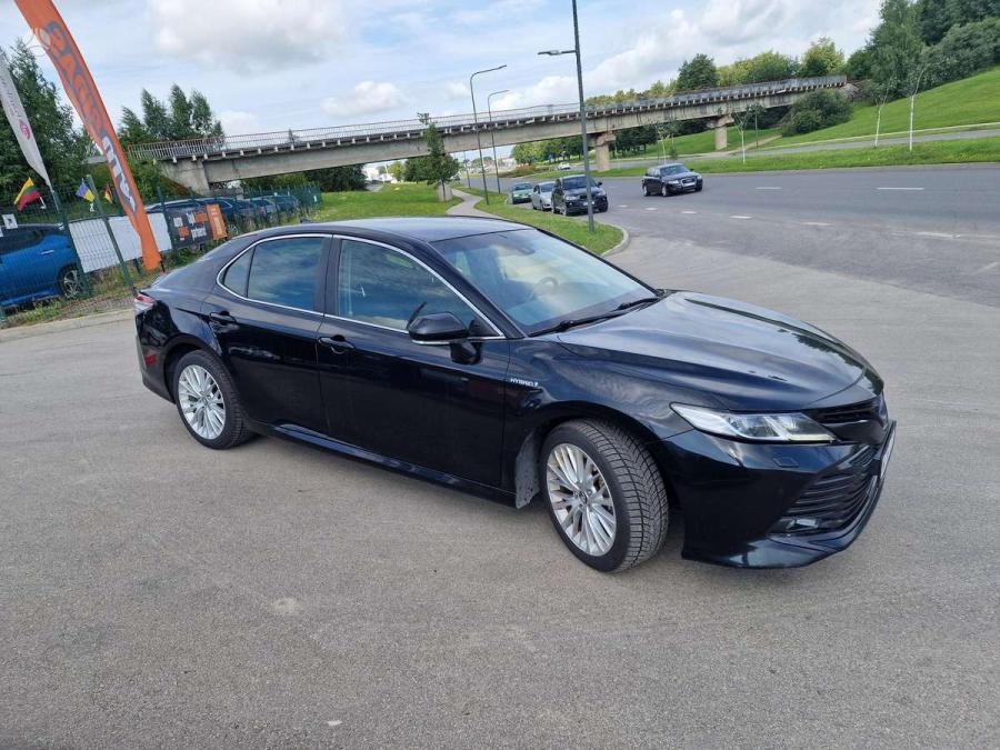 Black Toyota Camry 2019 in Kaunas, with an engine capacity of 2.49 L and mileage of 199 thousand km for 16490 €, photo 6 on AUTOMOTO.COM.LV