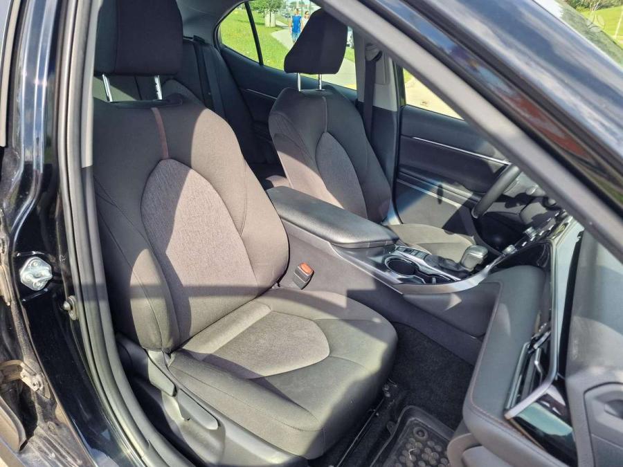 Black Toyota Camry 2019 in Kaunas, with an engine capacity of 2.49 L and mileage of 199 thousand km for 16490 €, photo 24 on AUTOMOTO.COM.LV