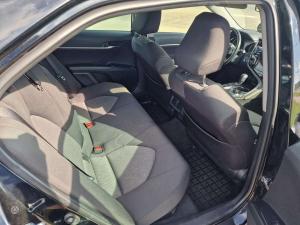 Black Toyota Camry 2019 in Kaunas, with an engine capacity of 2.49 L and mileage of 199 thousand km for 16490 €, photo 27 on AUTOMOTO.COM.LV