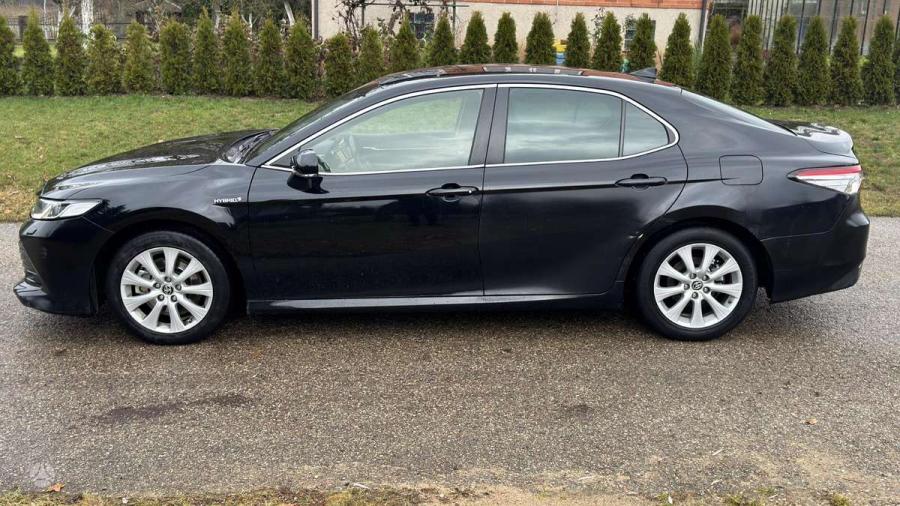 Black Toyota Camry 2021 in Jonava, with an engine capacity of 0.00 L and mileage of 280 thousand km for 11999 €, photo 16 on AUTOMOTO.COM.LV