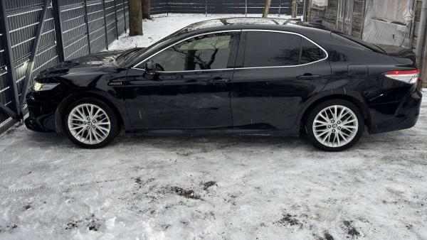 Black Toyota Camry 2021 in Jonava, with an engine capacity of 2.50 L and mileage of 240 thousand km for 11900 €, photo 4 on AUTOMOTO.COM.LV