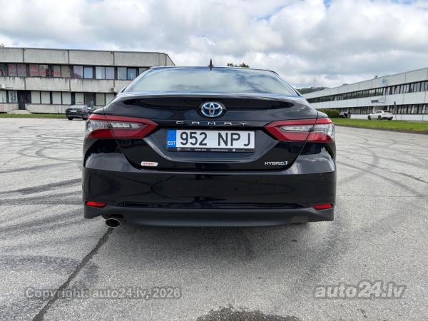 Black Toyota Camry 2021 in Tallinn, with an engine capacity of 2.50 L and mileage of 24 thousand km for 27990 €, photo 5 on AUTOMOTO.COM.LV