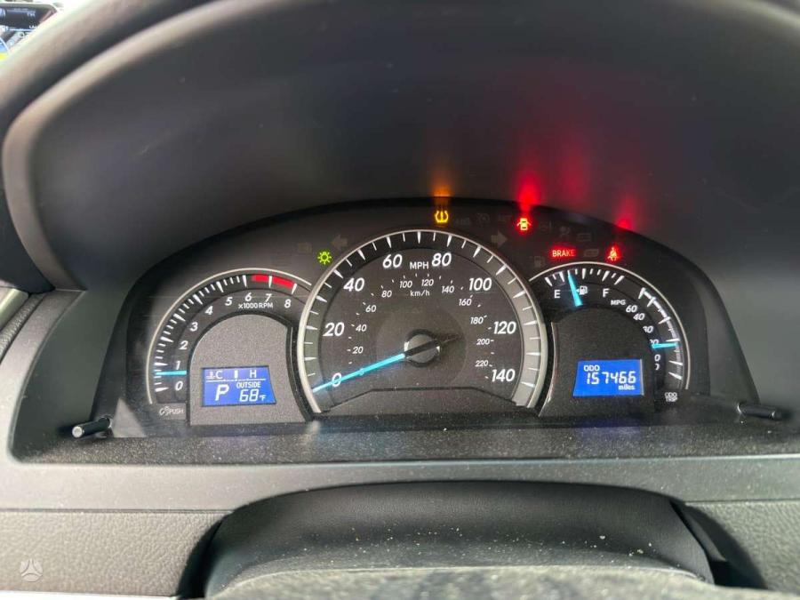 Blue Toyota Camry 2014 in Klaipeda, with an engine capacity of 2.49 L and mileage of 253 thousand km for 10000 €, photo 6 on AUTOMOTO.COM.LV