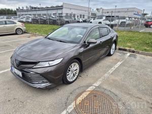 Brūns Toyota Camry 2019 Rīga, ar dzinēja tilpumu 2.50 L un nobraukumu 150 tūkst. km par 20500 €, foto  vietnē AUTOMOTO.COM.LV