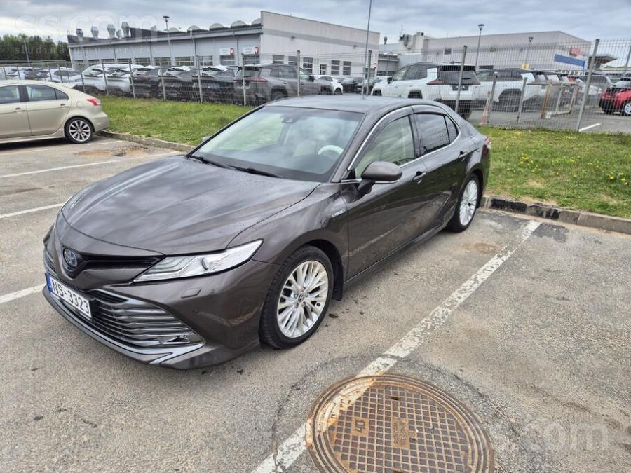 Brūns Toyota Camry 2019 Rīga, ar dzinēja tilpumu 2.50 L un nobraukumu 150 tūkst. km par 20500 €, foto 1 vietnē AUTOMOTO.COM.LV