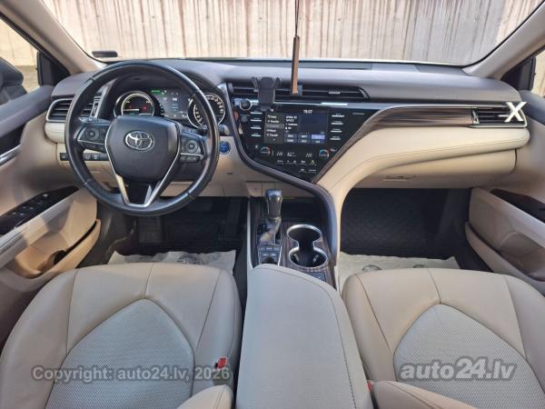 Brown Toyota Camry 2020 in Rakvere, with an engine capacity of 2.50 L and mileage of 107 thousand km for 23900 €, photo 3 on AUTOMOTO.COM.LV
