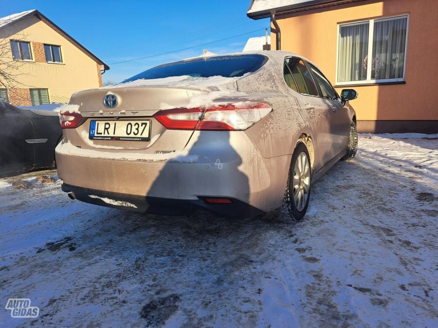 Brūns Toyota Camry 2021 Viļņa, ar dzinēja tilpumu 2.50 L un nobraukumu 62 tūkst. km par 25300 €, foto 2 vietnē AUTOMOTO.COM.LV