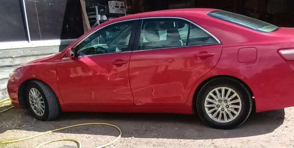 Red Toyota Camry 2006 in Kaunas, with an engine capacity of 2.36 L and mileage of 257 thousand km for 5000 €, photo 1 on AUTOMOTO.COM.LV