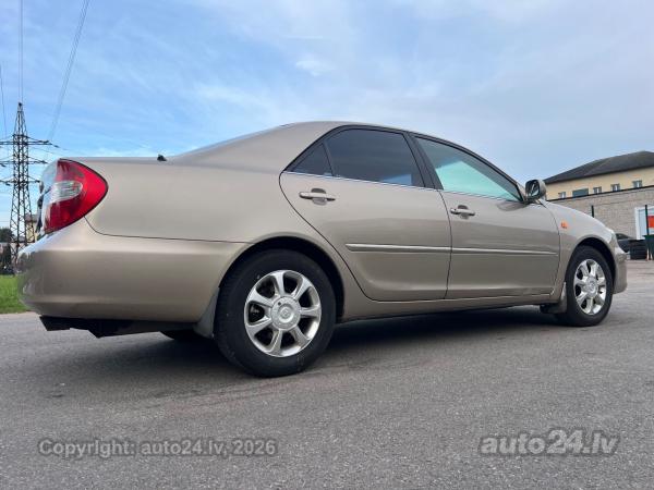 Dzeltens Toyota Camry 2003 Narva, ar dzinēja tilpumu 2.40 L un nobraukumu 188 tūkst. km par 2499 €, foto 10 vietnē AUTOMOTO.COM.LV