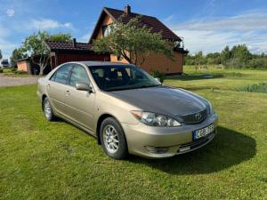 Yellow Toyota Camry 2006 in Siauliai, with an engine capacity of 2.36 L and mileage of 157 thousand km for 2200 €, photo  on AUTOMOTO.COM.LV