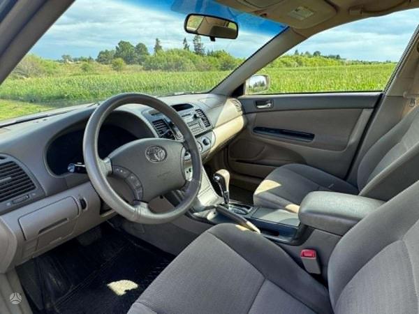 Yellow Toyota Camry 2006 in Siauliai, with an engine capacity of 2.36 L and mileage of 157 thousand km for 2200 €, photo 10 on AUTOMOTO.COM.LV