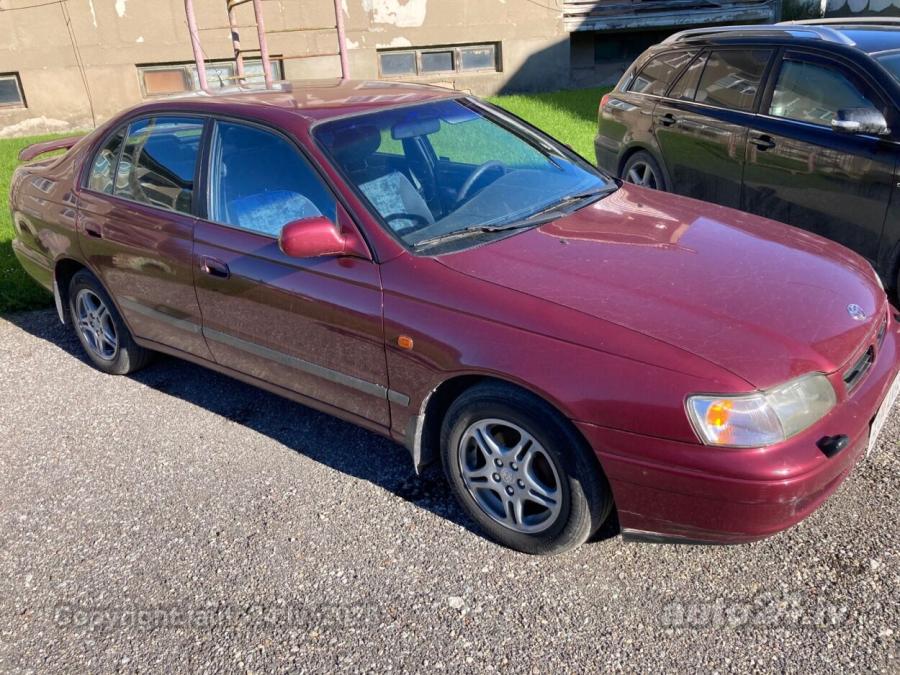 Sarkans Toyota Carina 1997 Rapla, ar dzinēja tilpumu 1.60 L un nobraukumu 140 tūkst. km par 2000 €, foto 1 vietnē AUTOMOTO.COM.LV