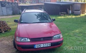 Sarkans Toyota Carina 1995 Daugavpils, ar dzinēja tilpumu 1.80 L un nobraukumu 366 tūkst. km par 1200 €, foto  vietnē AUTOMOTO.COM.LV