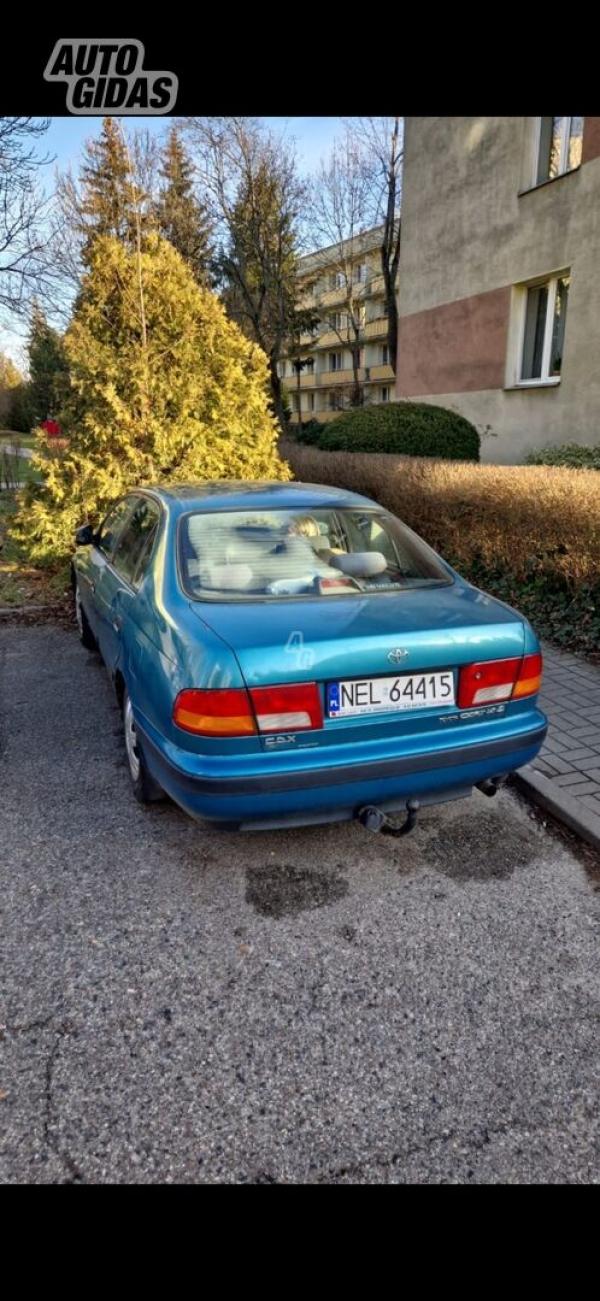 Toyota Carina 1996 in Marijampole, with an engine capacity of 1.60 L and mileage of 241 thousand km for 1499 €, photo 2 on AUTOMOTO.COM.LV