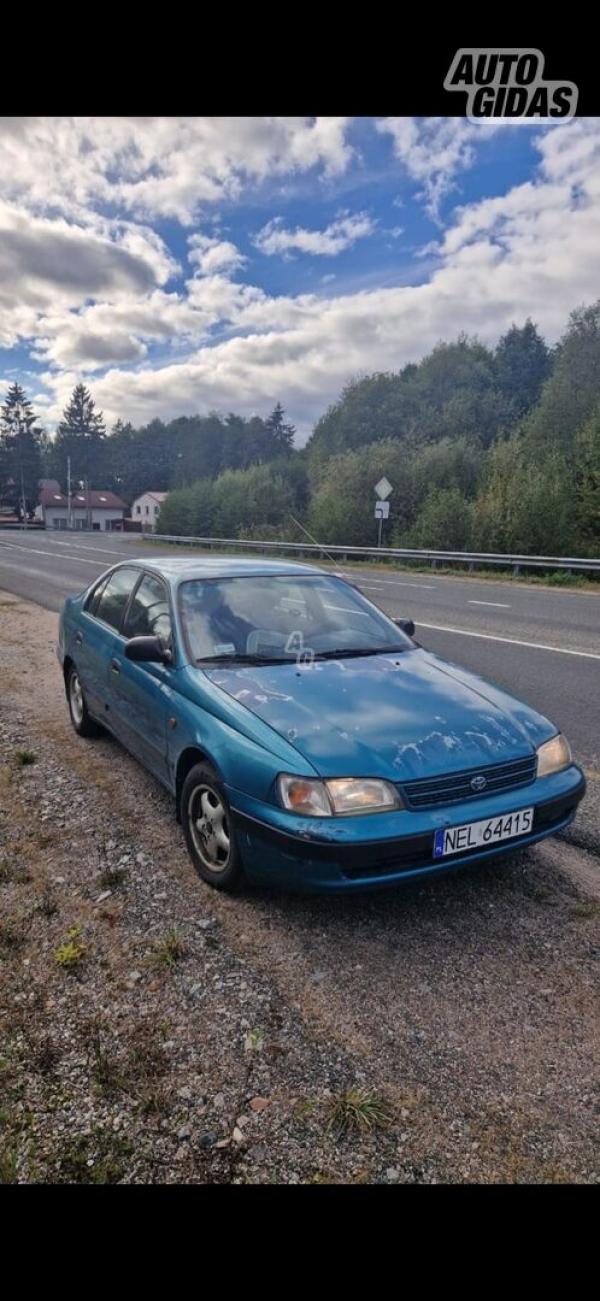 Toyota Carina 1996 in Marijampole, with an engine capacity of 1.60 L and mileage of 241 thousand km for 1499 €, photo 5 on AUTOMOTO.COM.LV